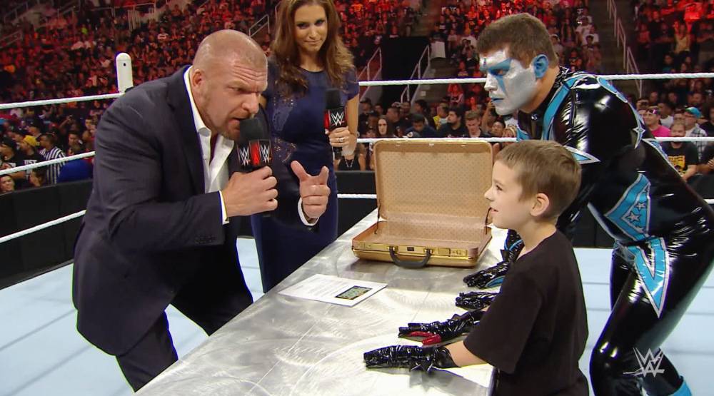 Great Video Of 8-Year-Old Elijah Signing His WWE Contract On Raw