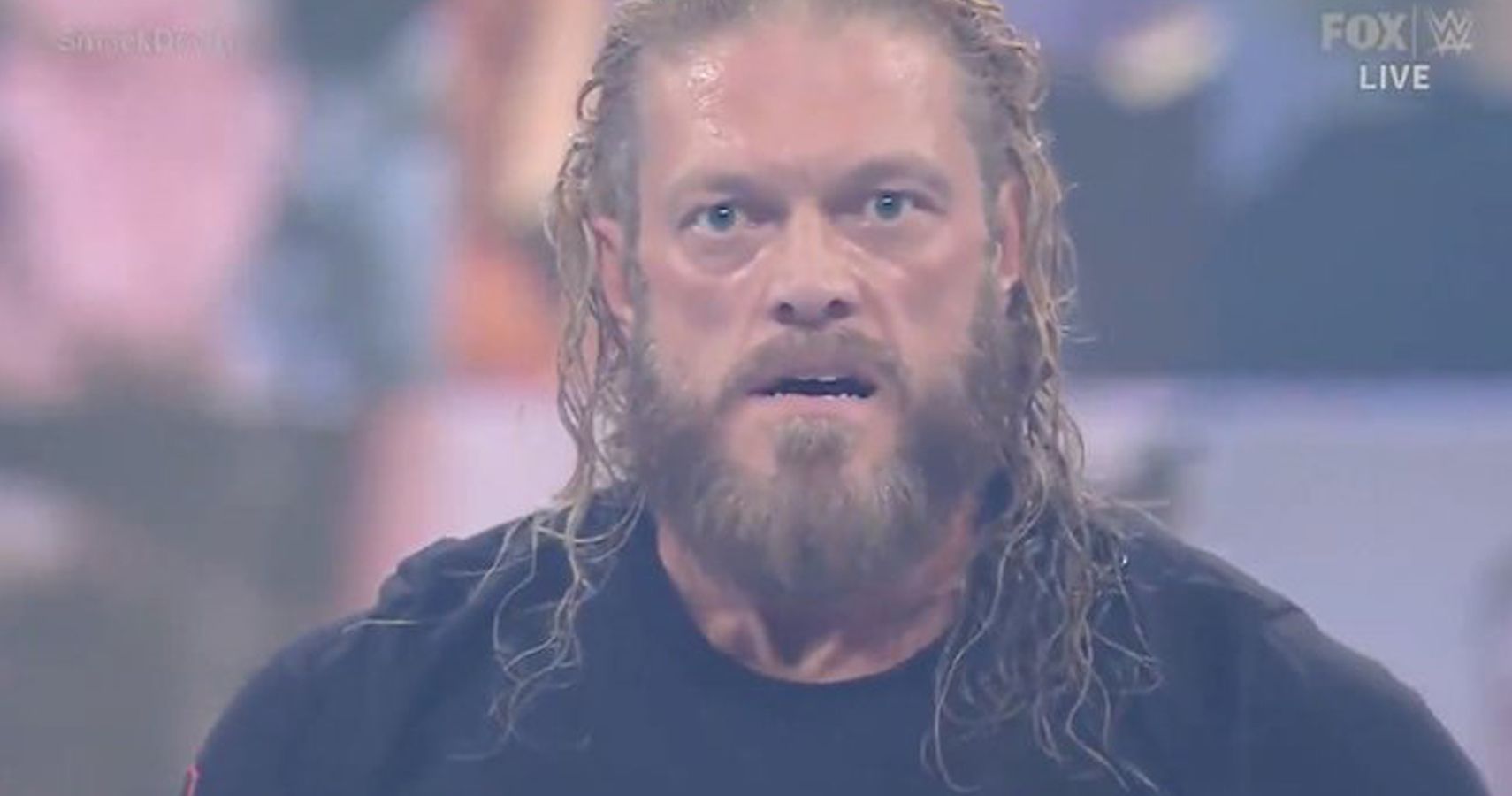 Edge Returns To WWE On SmackDown, Goes After Roman Reigns