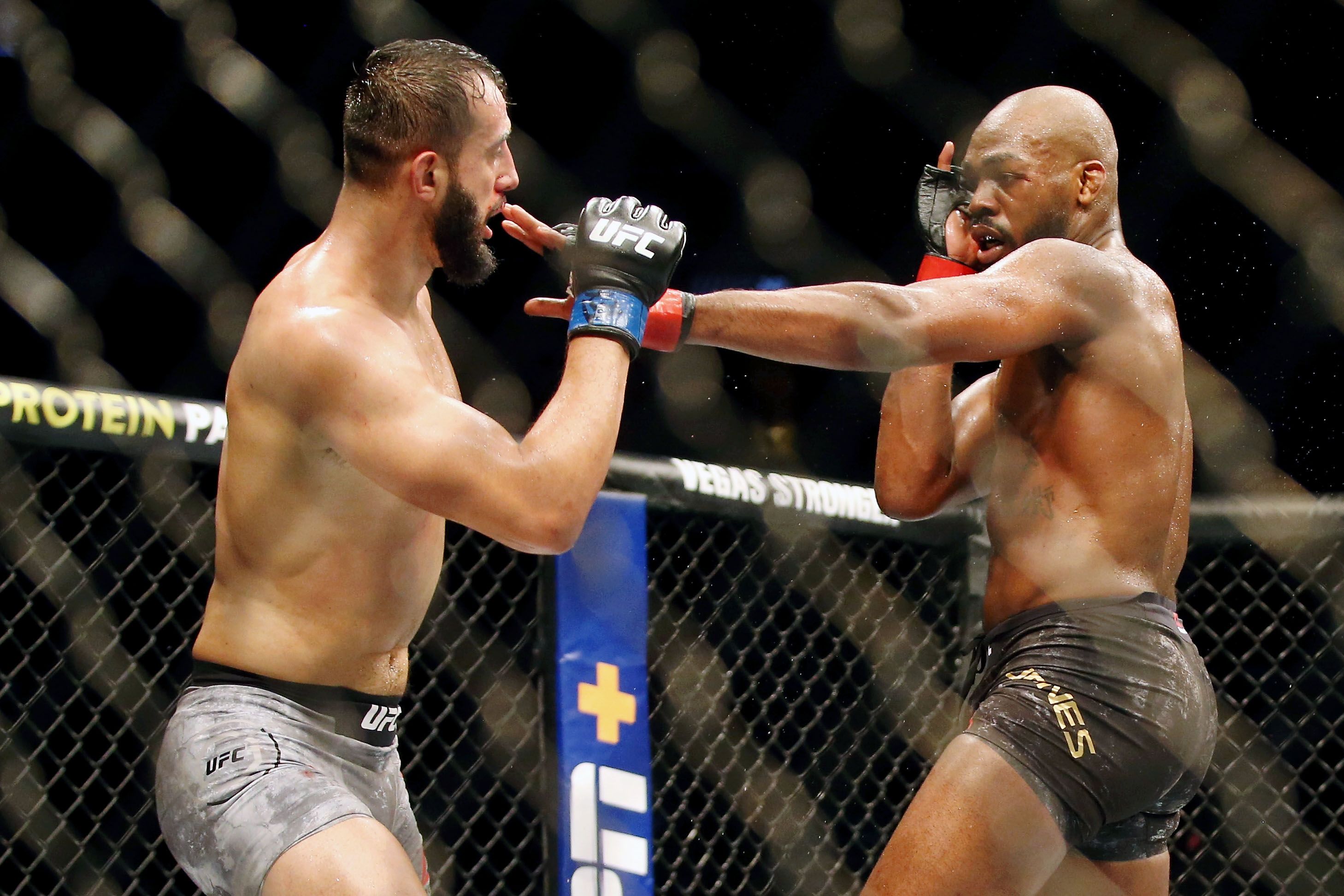 10 Times UFC Champions Almost Lost Their Titles (But Didn't)