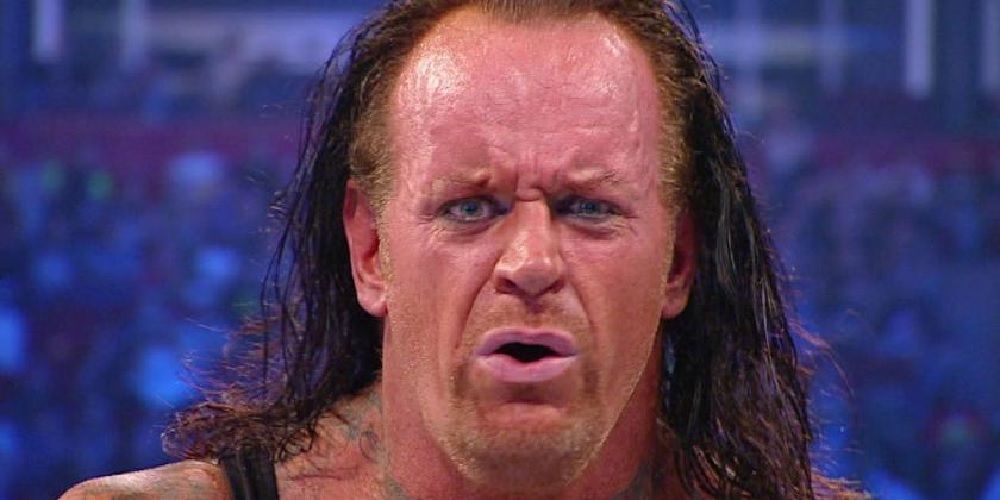 Teddy Long & Undertaker's Unexpected Bond, Explained