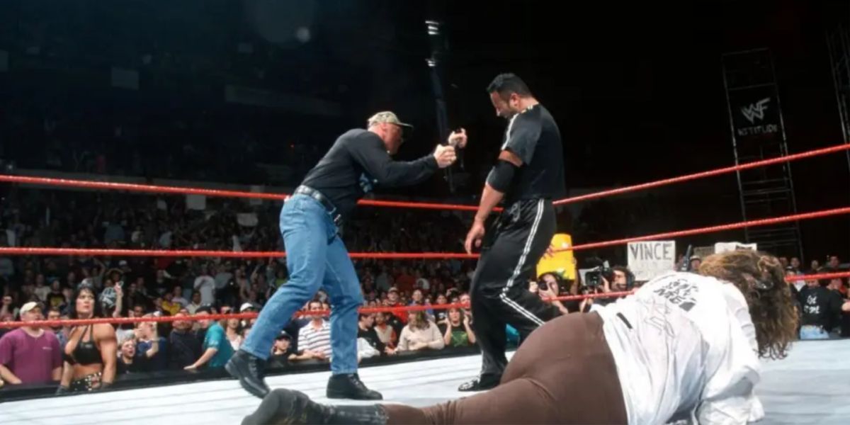 10 World Title Changes In WWE That Happened Because Of Outside Interference