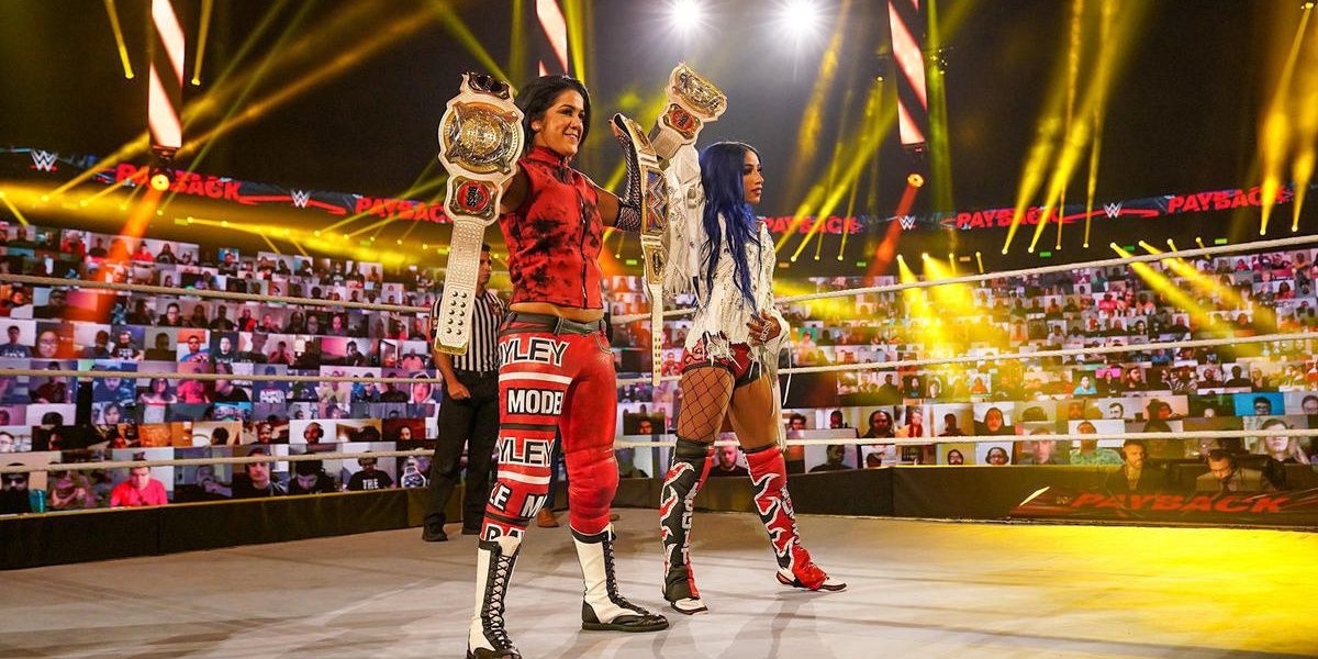 Roman Reigns & 9 Reigning World Champions Who Have Competed For A Tag ...