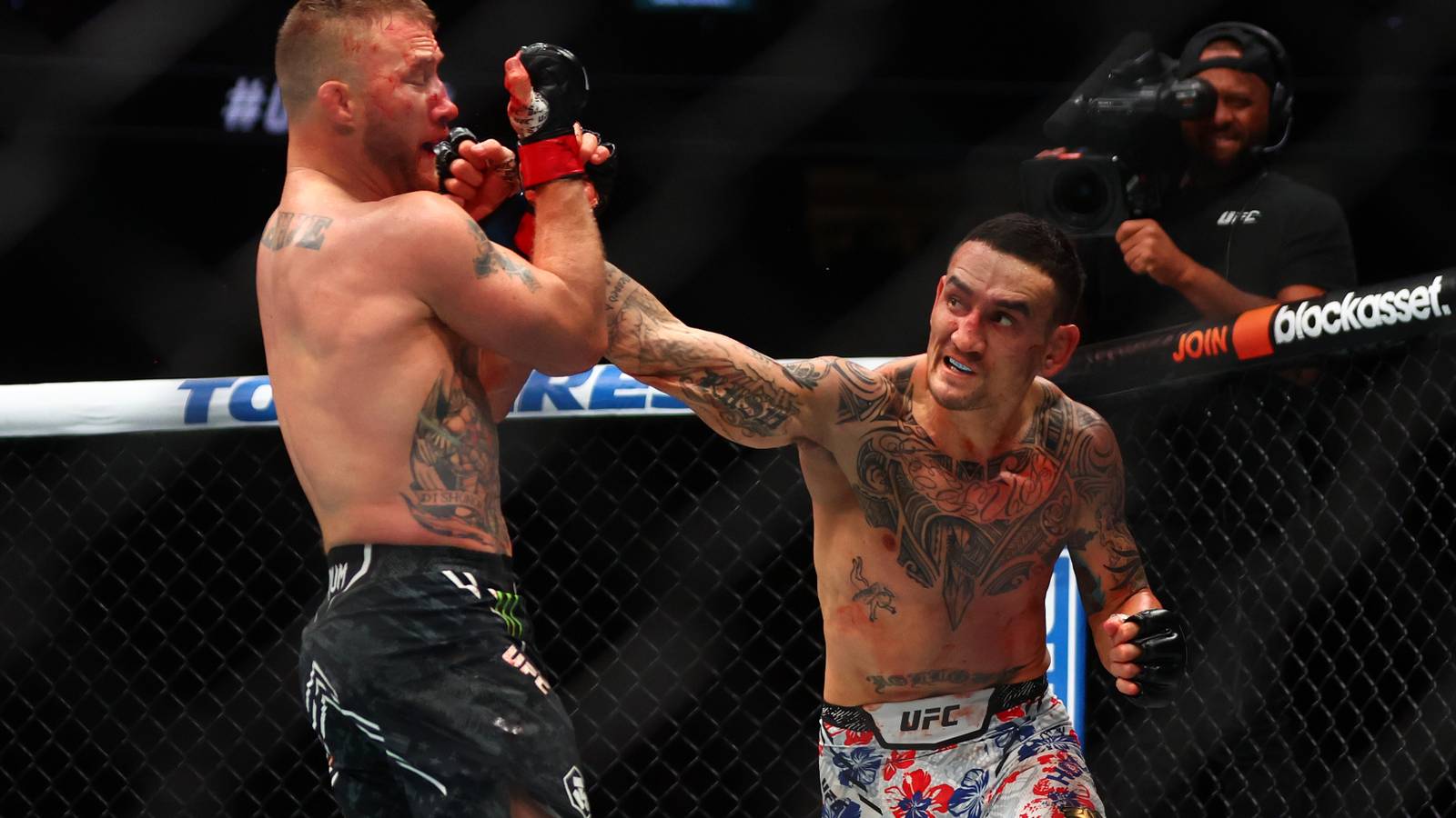 Max Holloway Wins The BMF Title With Crazy Last Second Knockout Against ...