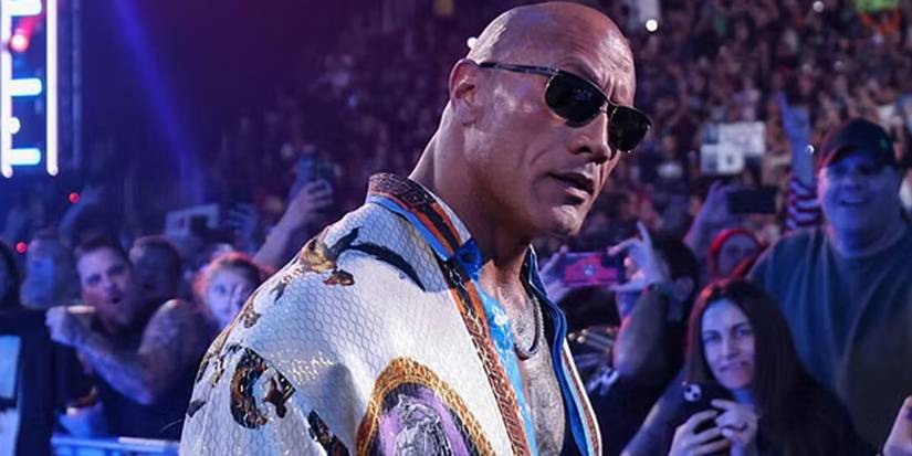 Why The Rock Briefly Wrestled In A Tracksuit In WWE, Explained
